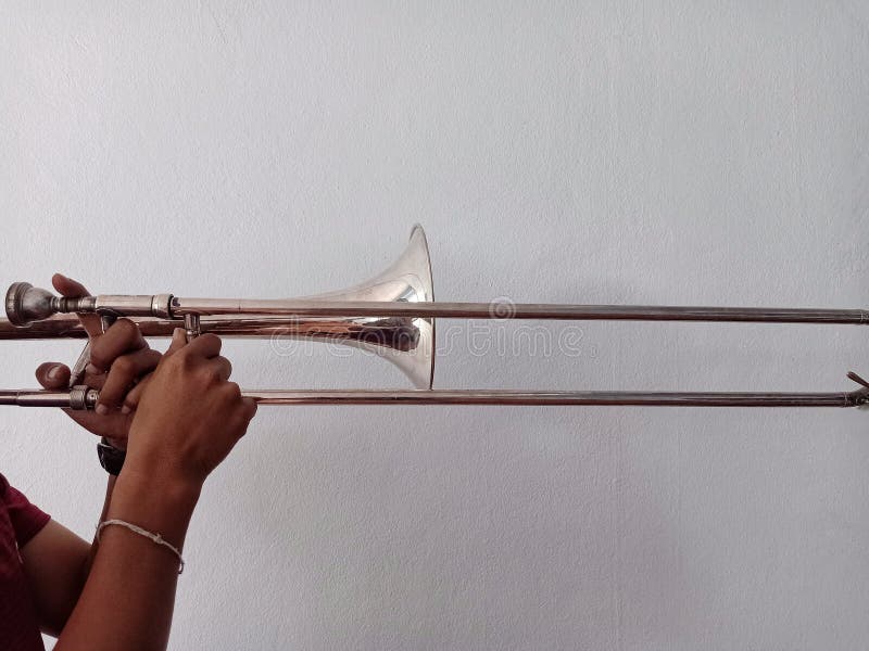 Men Practice Trombone Playing As A Song In Order To Play With Large Bands At Important Festivals