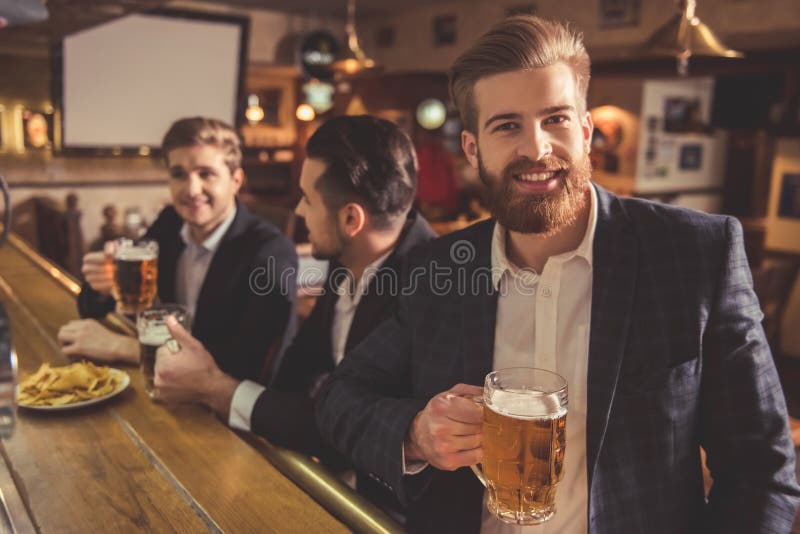 Men at the pub stock photo. Image of counter, friendship - 85654814