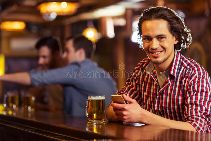Men in pub stock image. Image of group, adult, caucasian - 67778351