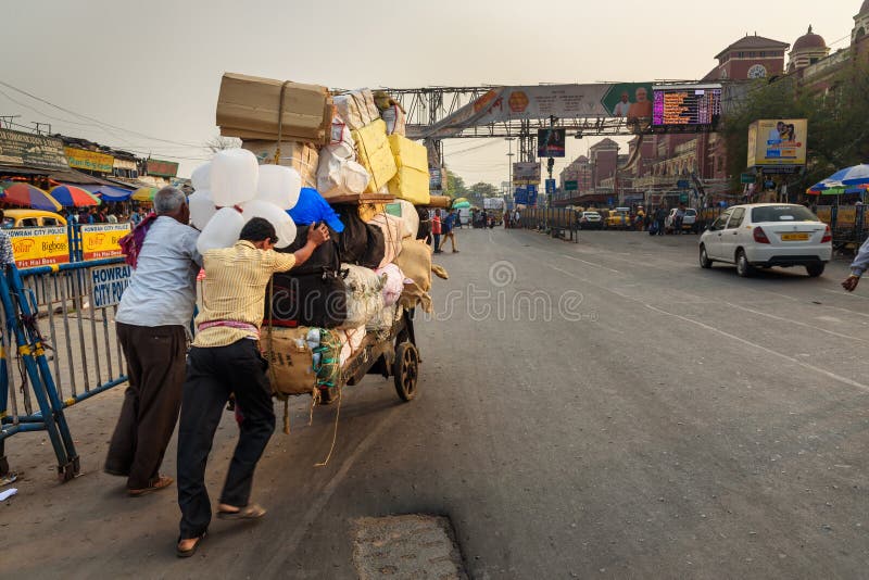 Men Pushing Loaded Cart on Road in Kolkata. India Editorial Photography ...