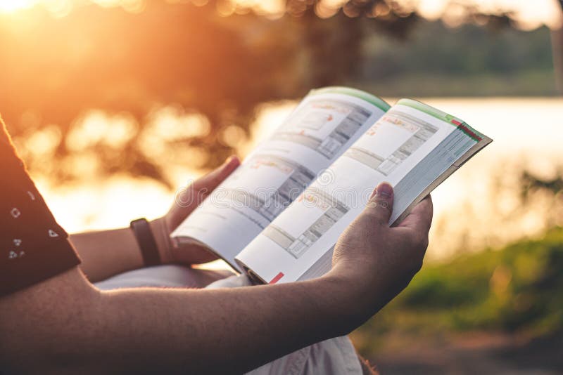 Men Read Book in Quiet Nature, Concept Read a Book Stock Image - Image ...