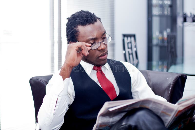 Men reading the news paper stock image. Image of reading - 24260889