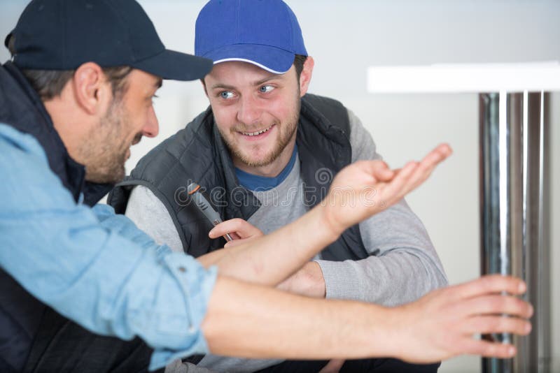 Men Repairing Chair at Home Stock Image - Image of young, clean: 268033943