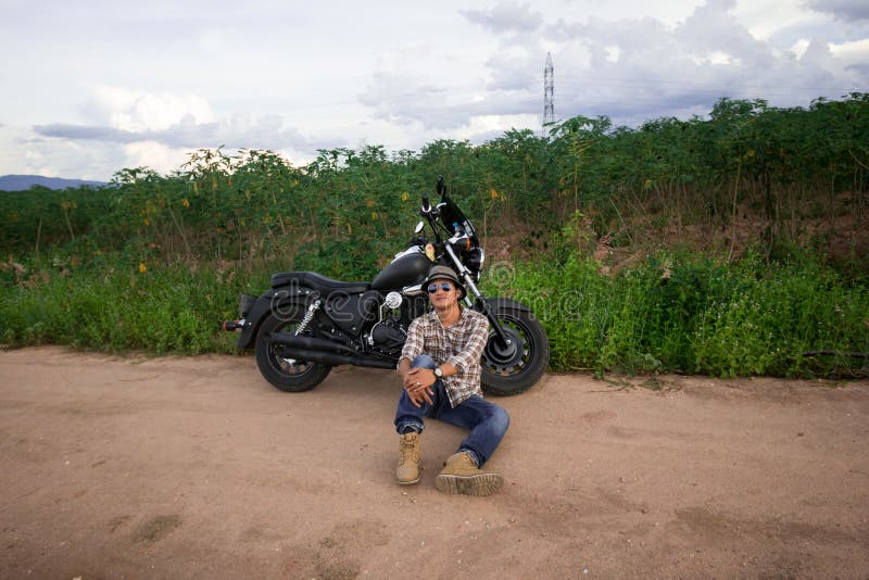 Men riding a motorcycle stock photo. Image of nature - 118913064