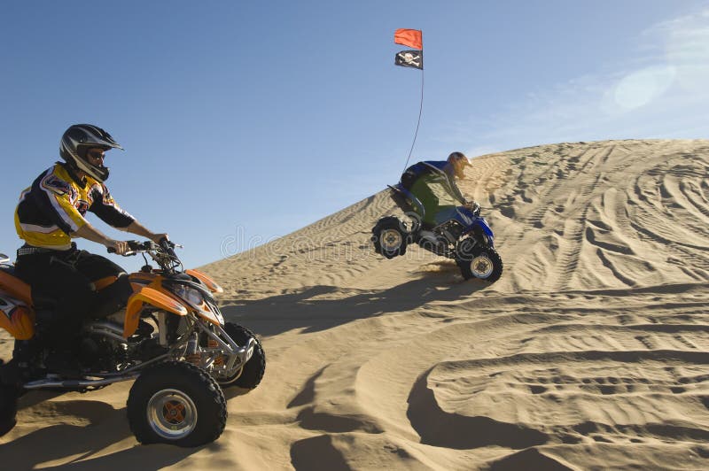 Men Riding Quad Bikes in Desert Stock Photo - Image of remote ...