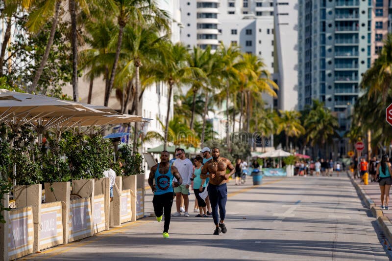 Men Running on Ocean Drive Florida Miami Beach Editorial Stock Photo ...