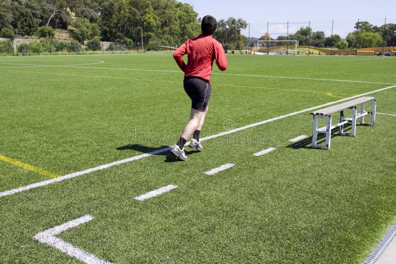 Men Running on Outdoor Playing Field Stock Photo - Image of league ...