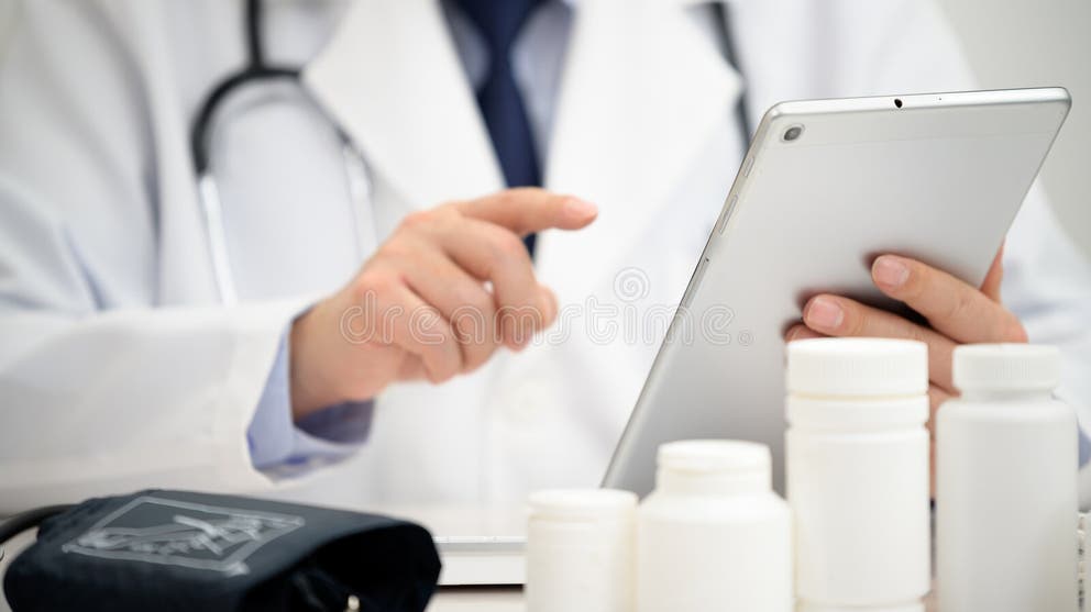 Men S Doctors Using Tablets, Telemedicine Concepts Stock Photo - Image ...