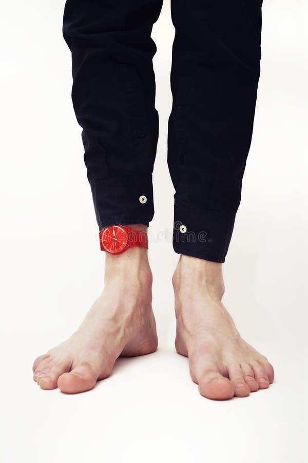 Men S Feet with the Red Clock Stock Photo - Image of floor, body: 19885560