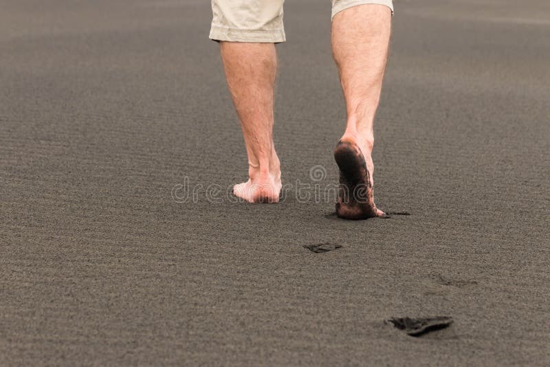 Men S Footprints in Volcanic Sand Stock Image - Image of bare, body ...