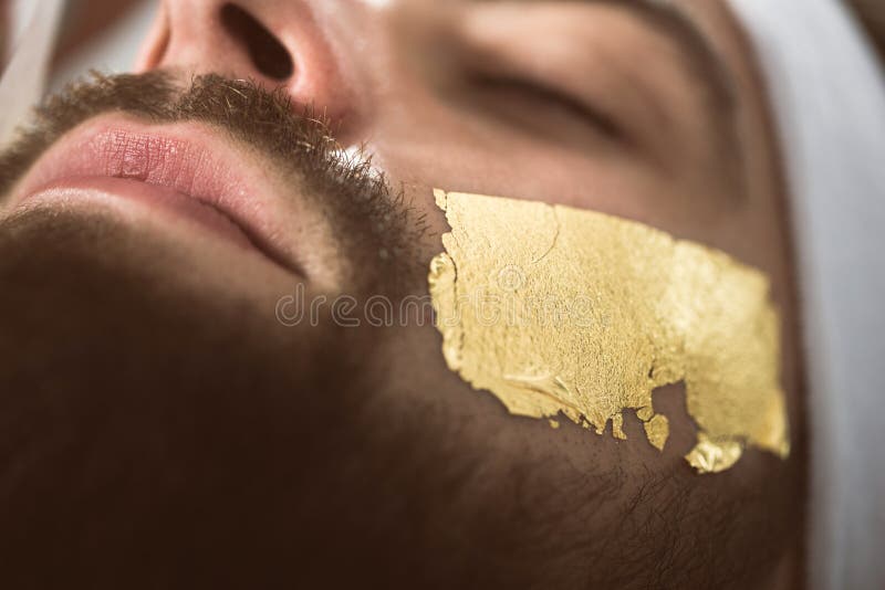 Men`s Gold Mask Therapy at Beautician`s Stock Image - Image of colored ...