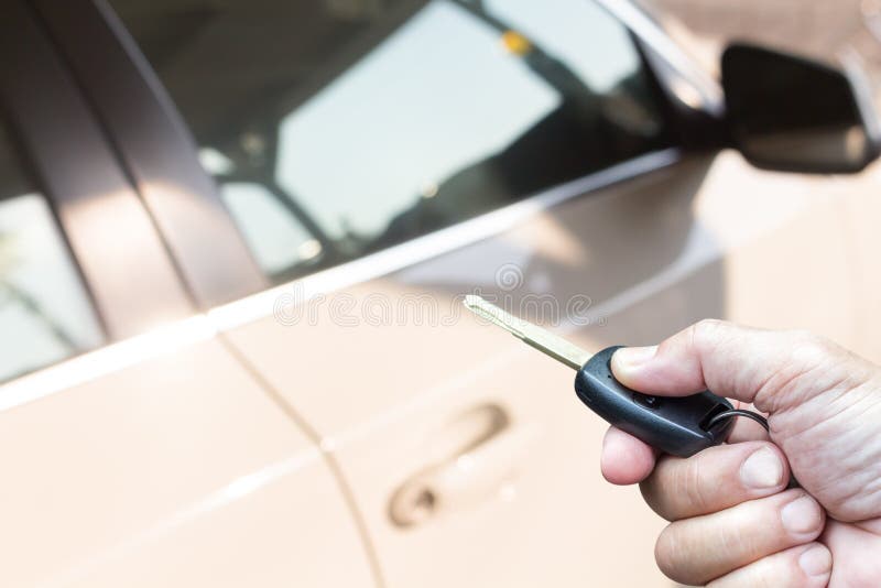 Men Hand Presses on the Remote Control Car Key Stock Image - Image of ...