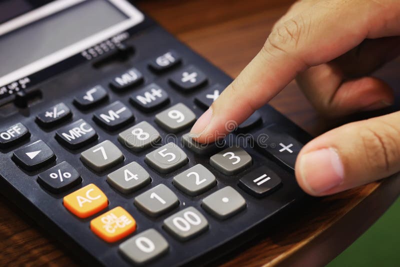 Businessman Pressing Calculator For Accounting And Finance On Work ...