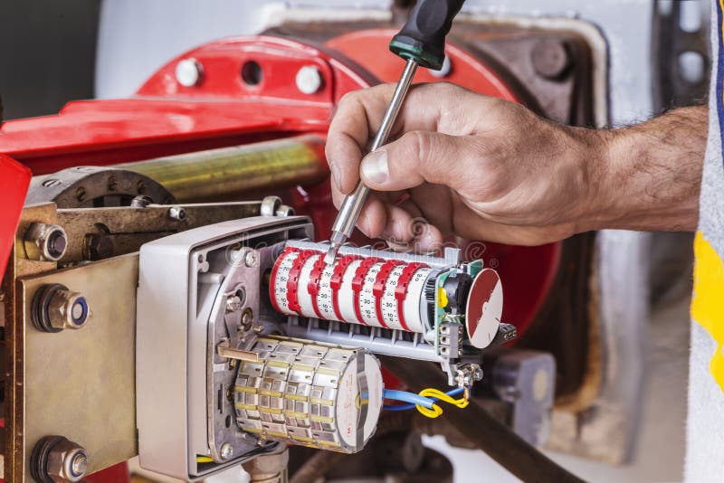 Men S Hand with Tool on Gas and Air Mixture Regulator Stock Image ...