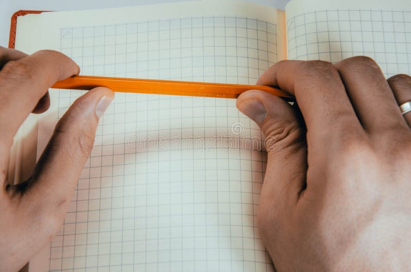 Men`s Hands, Forearm Hold a Pen, Notebook, Smartphone. Hands Write in ...