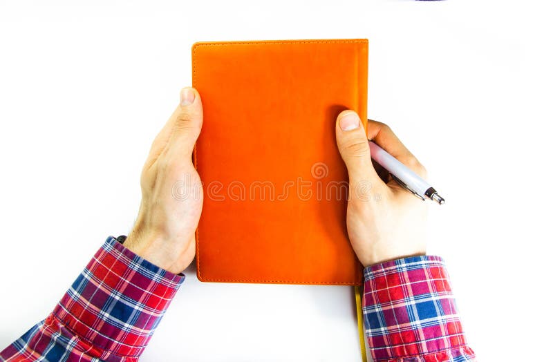 Men`s Hands, Forearm Hold a Pen, Notebook, Smartphone. Hands Write in ...