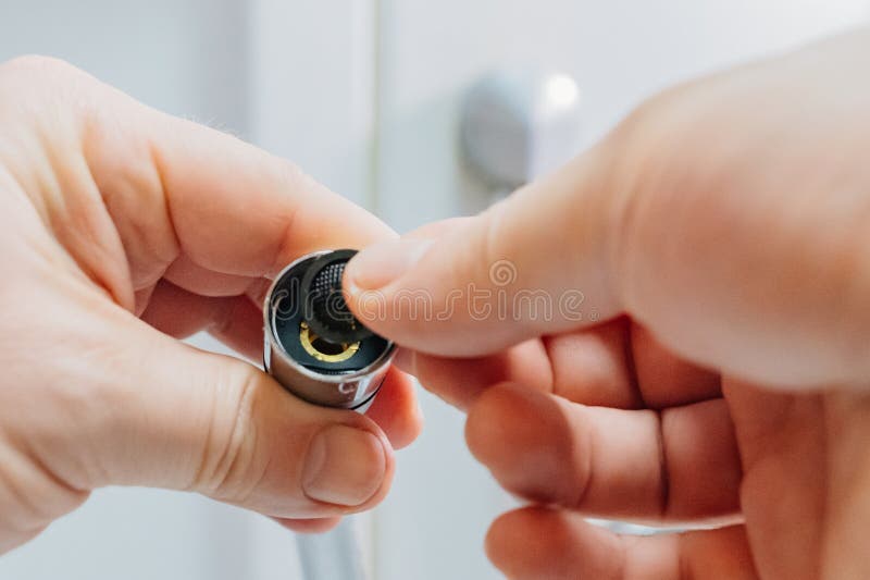 Men& X27;s Hands Insert a Coarse Filter Mesh into the Shower Hose ...