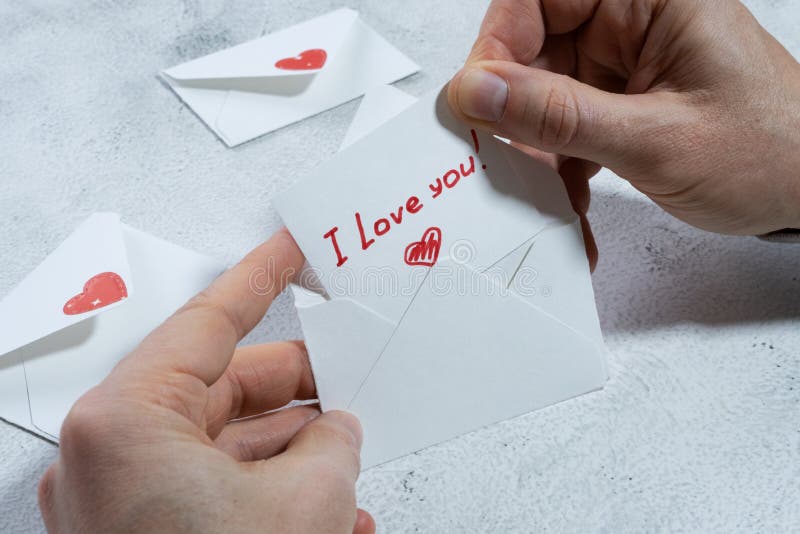 Men S Hands Open a White Envelope with a Heart Stock Image - Image of ...