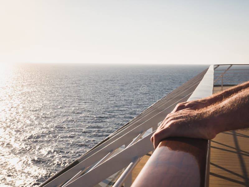 Men`s hands on the railing stock image. Image of ship - 121890633
