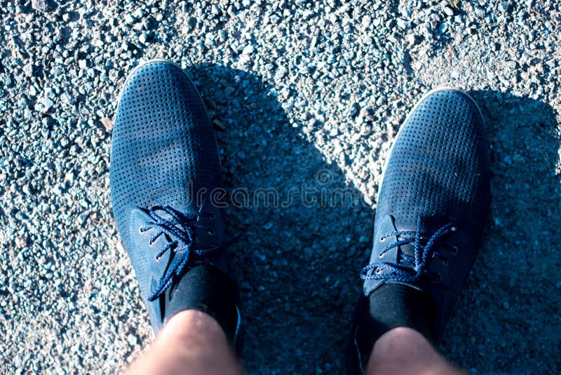 Men`s Legs in Blue Shoes on the Asphalt. Stock Image - Image of ...