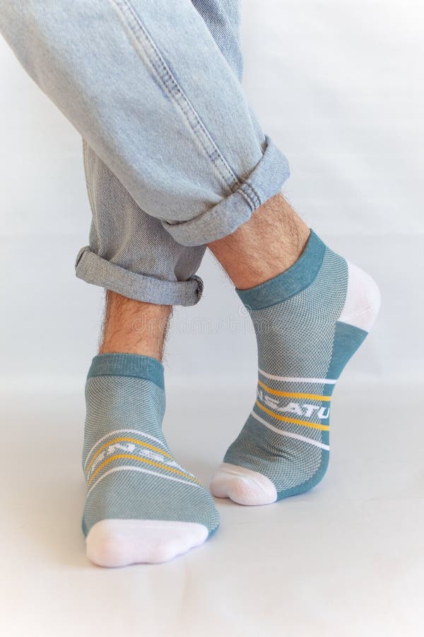 Men S Legs in Jeans and Light Socks on a White Background Stock Photo ...
