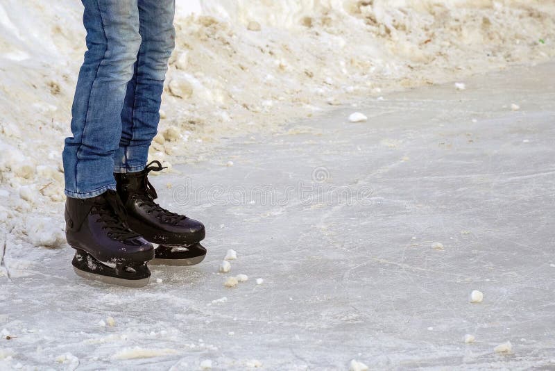 Men`s Legs in Jeans with the Put on Skates Stock Image - Image of ...