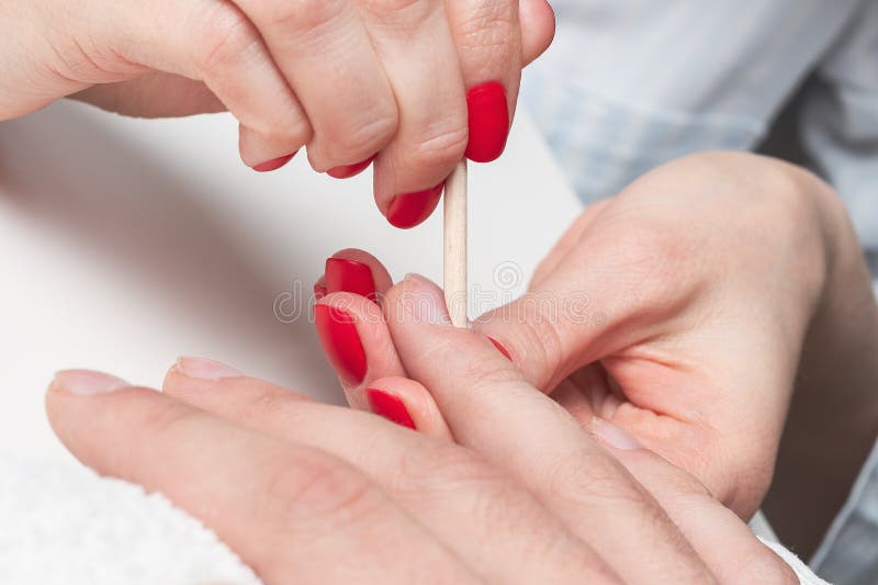 Men`s Manicure. the Hands of the Beautician Treated Cuticle of Men`s ...