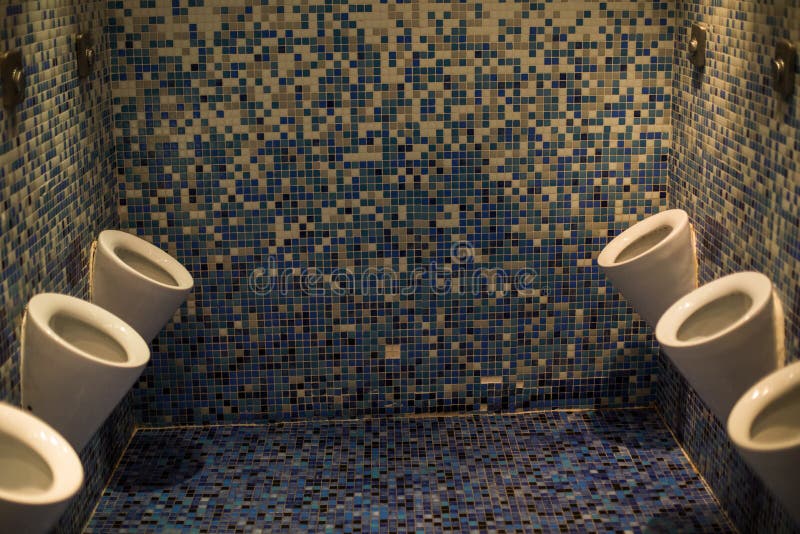 Men`s public toilet stock photo. Image of interior, building - 166274256