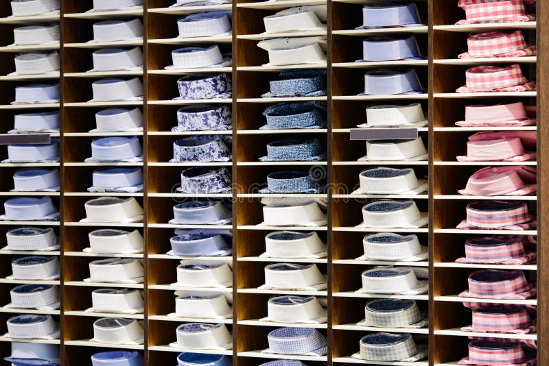 Men`s shirts on a shelf editorial photography. Image of outfitters ...