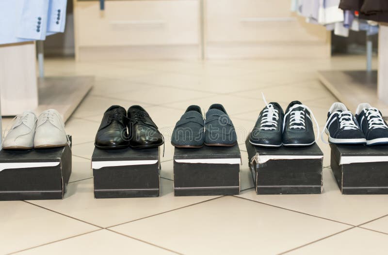 Men S Shoes on Black Boxes. Stock Image - Image of boutique, gumshoes ...
