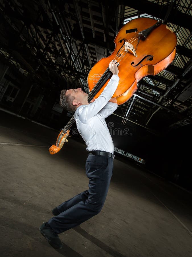 Men S White Shirt with Double Bass Player Stock Image - Image of people ...