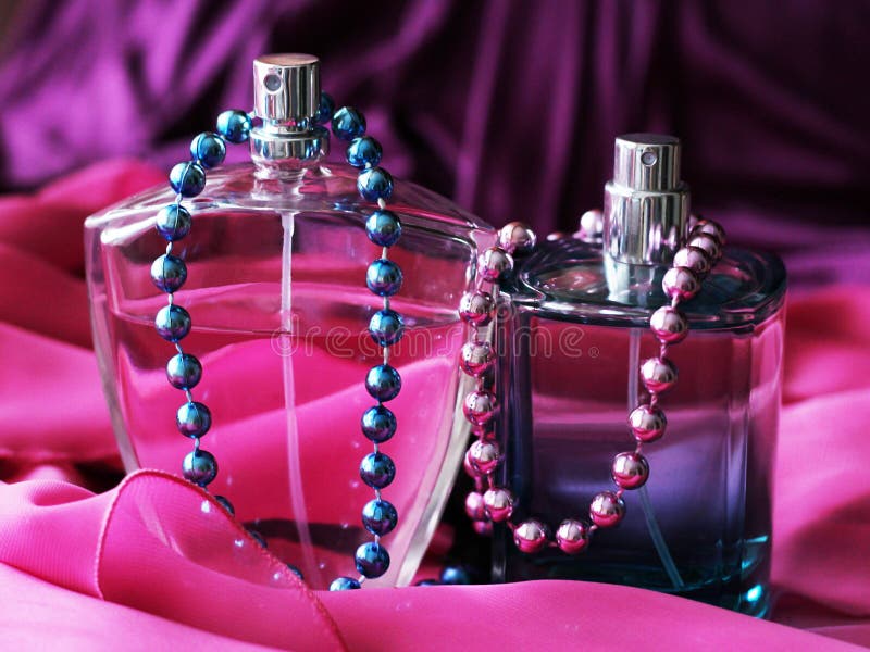 Men`s and Women`s Perfume in a Glass Bottle, Two Object Stock Photo ...