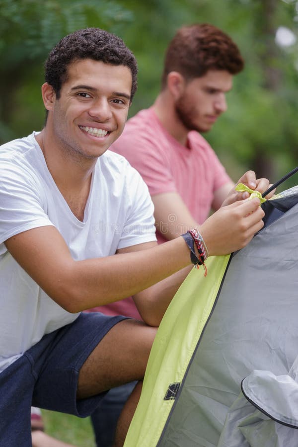 Men Setting Up Tent in Forest Camp Stock Image - Image of great ...