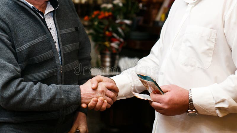 Men shaking hands stock photo. Image of handshake, standing - 245127380