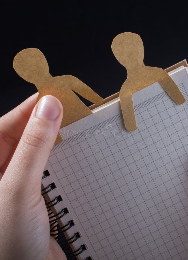 Men Shape Cut Out of Paper in Notebbok Stock Image - Image of kids ...
