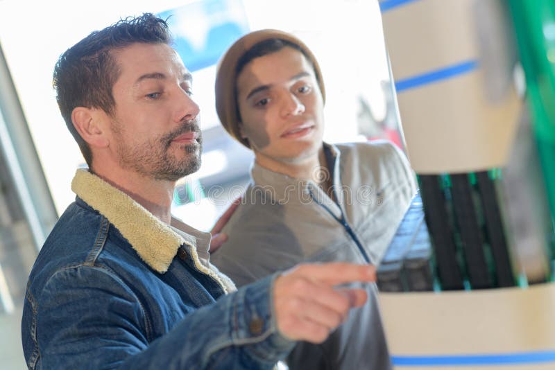 2 Men Shopping in Retail Store Stock Image - Image of mature, guys ...