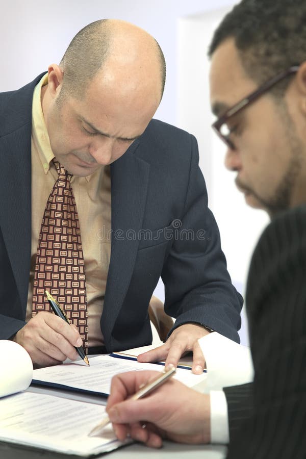 Men sign the contract stock image. Image of contract - 13404161