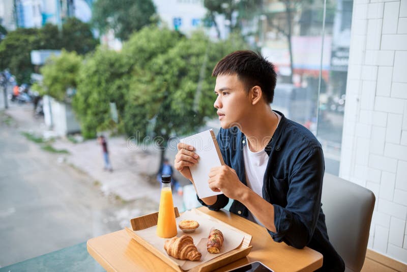 Men is Sitting in the Coffee Shop, Thinking. Bakery and Tea Time Stock ...