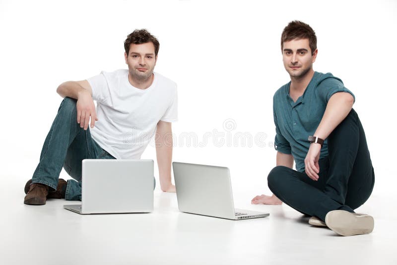 Men Sitting in Front of Laptops Stock Image - Image of smiling ...