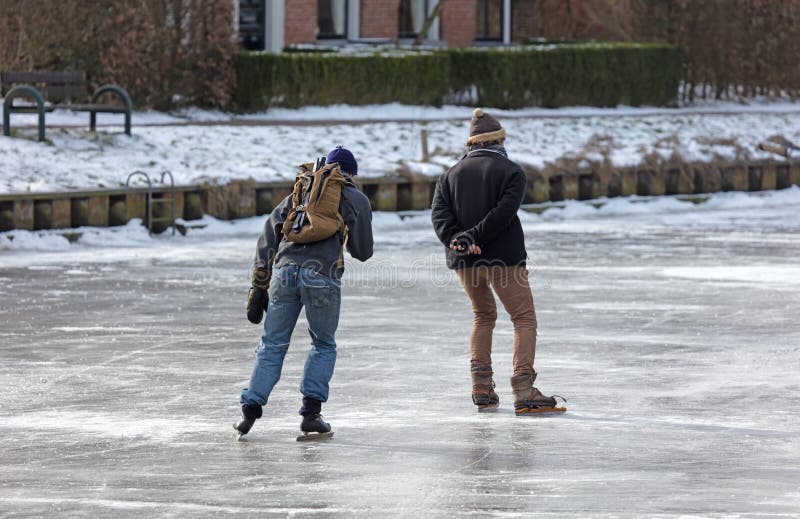 Men Skating on Natural Ice, Netherlands Stock Image - Image of snow ...