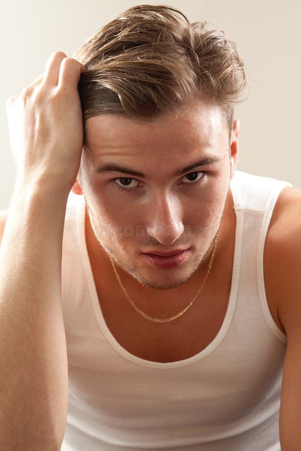 Skin Problems. Worried Man with a Stubble Examining His Face and ...