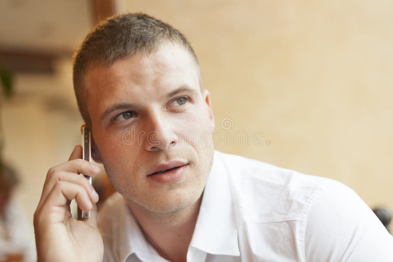 Men Speaking on Mobile Phone and Holding Secund Stock Image - Image of ...