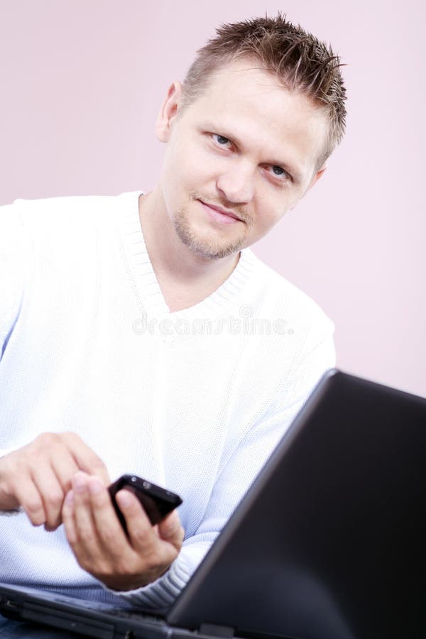 Men Sofa with Phone and Computer Use. Stock Photo - Image of calling ...