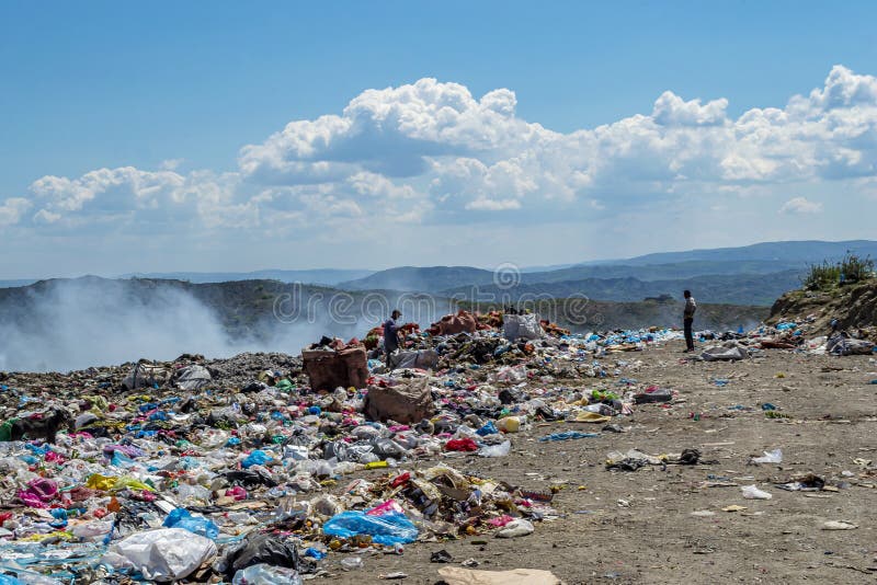 Men Sorting Garbage for Recycling in a Dumping Ground of Food and ...