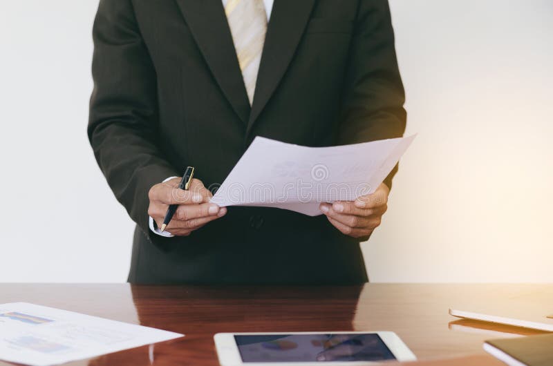 Men Standing at Desk and Reading Document Hand Close Up. Stock Photo ...