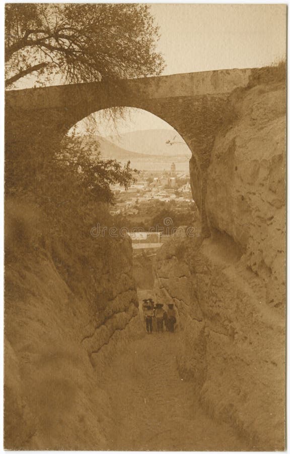 [Men Standing Under Stone Archway] Picture. Image: 222603309