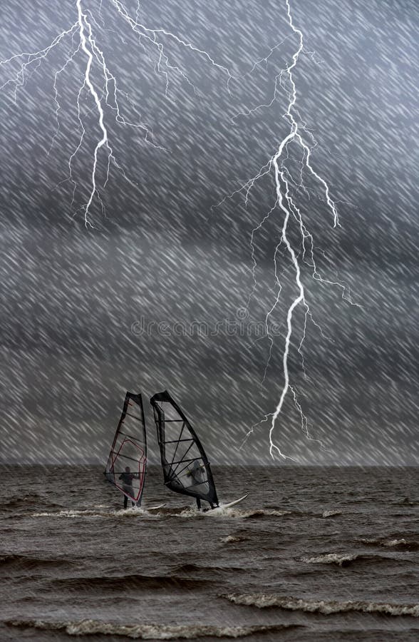 Men surfing in storm stock photo. Image of dark, lightning - 34565042