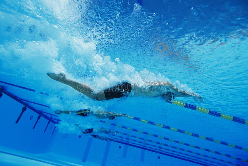 Men Swimming Underwater stock image. Image of angle, male - 30842015