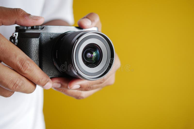 A Men is Taking Pictures on a Camera. Stock Photo - Image of taking ...