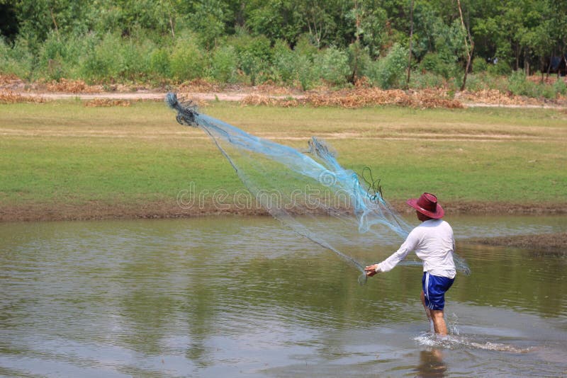 Men Throw a Net on the River. Editorial Photography - Image of white ...